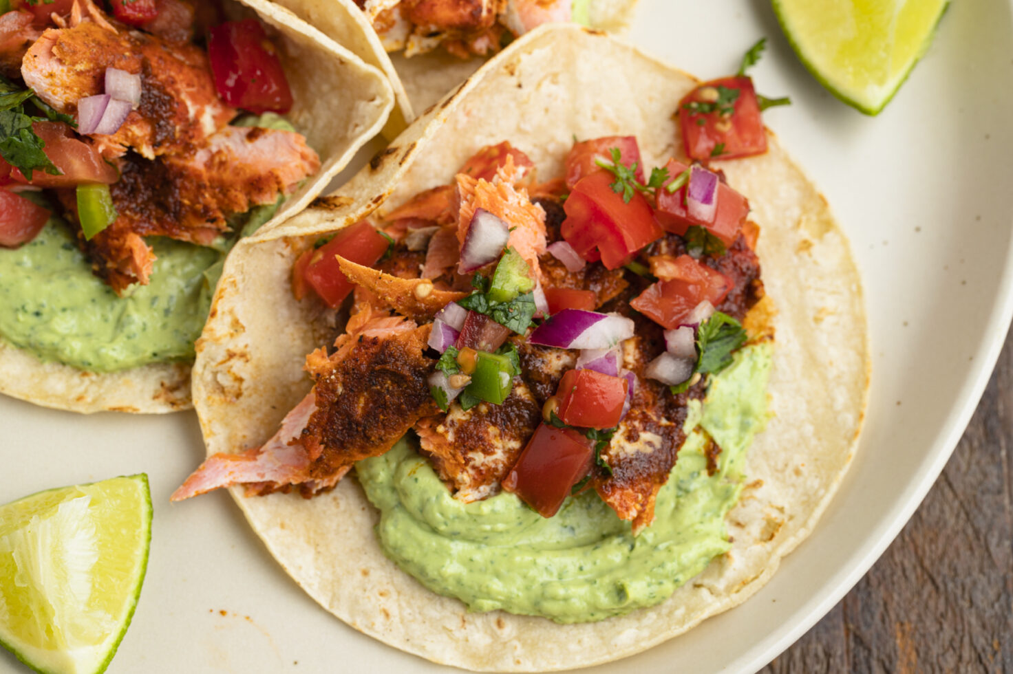 Try these Salmon Tacos with Avocado Crema on Taco Tuesday!